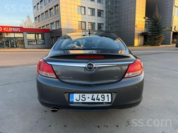 Pelēks Opel Insignia 2009 Rīga, ar dzinēja tilpumu 2.00 L un nobraukumu 253 tūkst. km par 2500 €, foto 3 vietnē AUTOMOTO.COM.LV