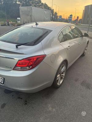 Grey Opel Insignia 2011 in Trakai, with an engine capacity of 1.96 L and mileage of 315 thousand km for 2400 €, photo 5 on AUTOMOTO.COM.LV