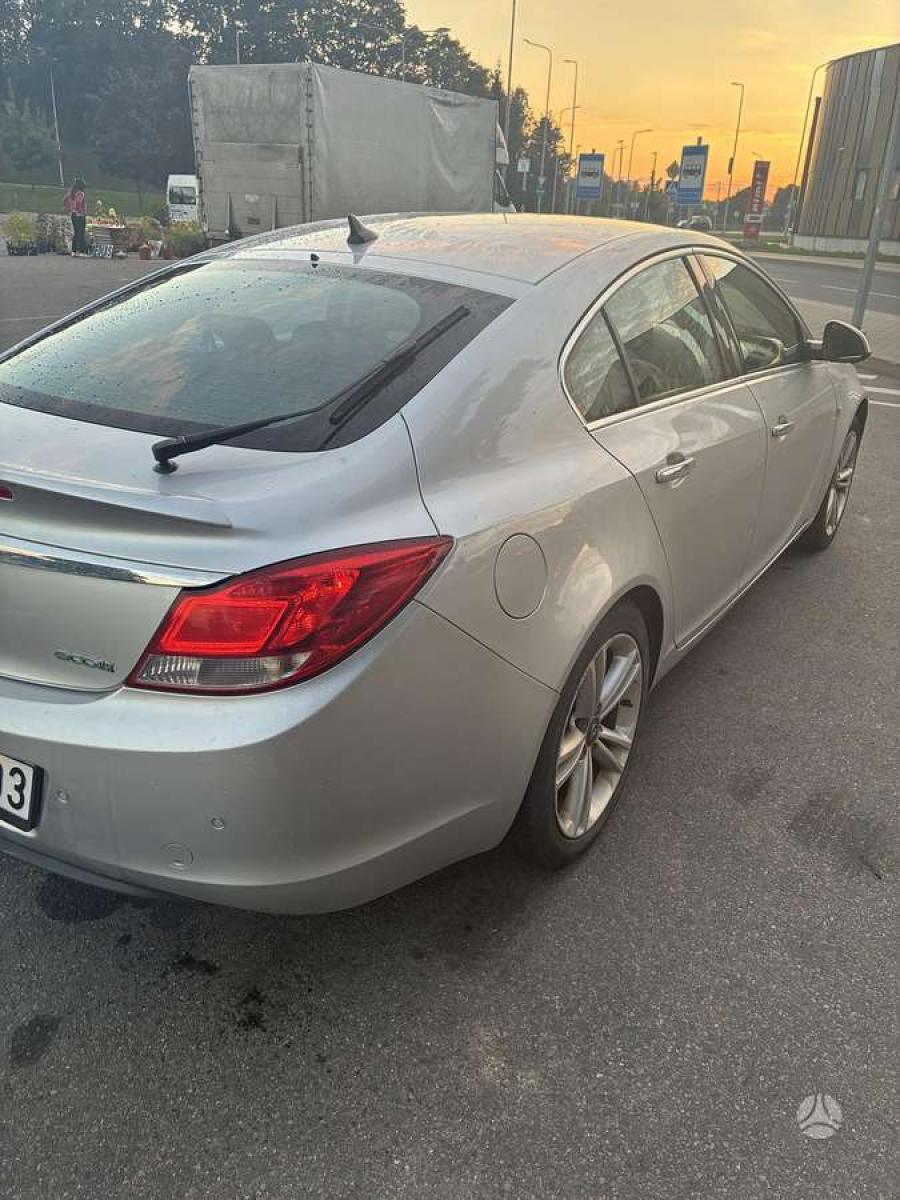 Grey Opel Insignia 2011 in Trakai, with an engine capacity of 1.96 L and mileage of 315 thousand km for 2400 €, photo 5 on AUTOMOTO.COM.LV