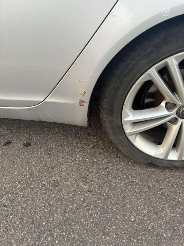 Grey Opel Insignia 2011 in Trakai, with an engine capacity of 1.96 L and mileage of 315 thousand km for 2400 €, photo 8 on AUTOMOTO.COM.LV