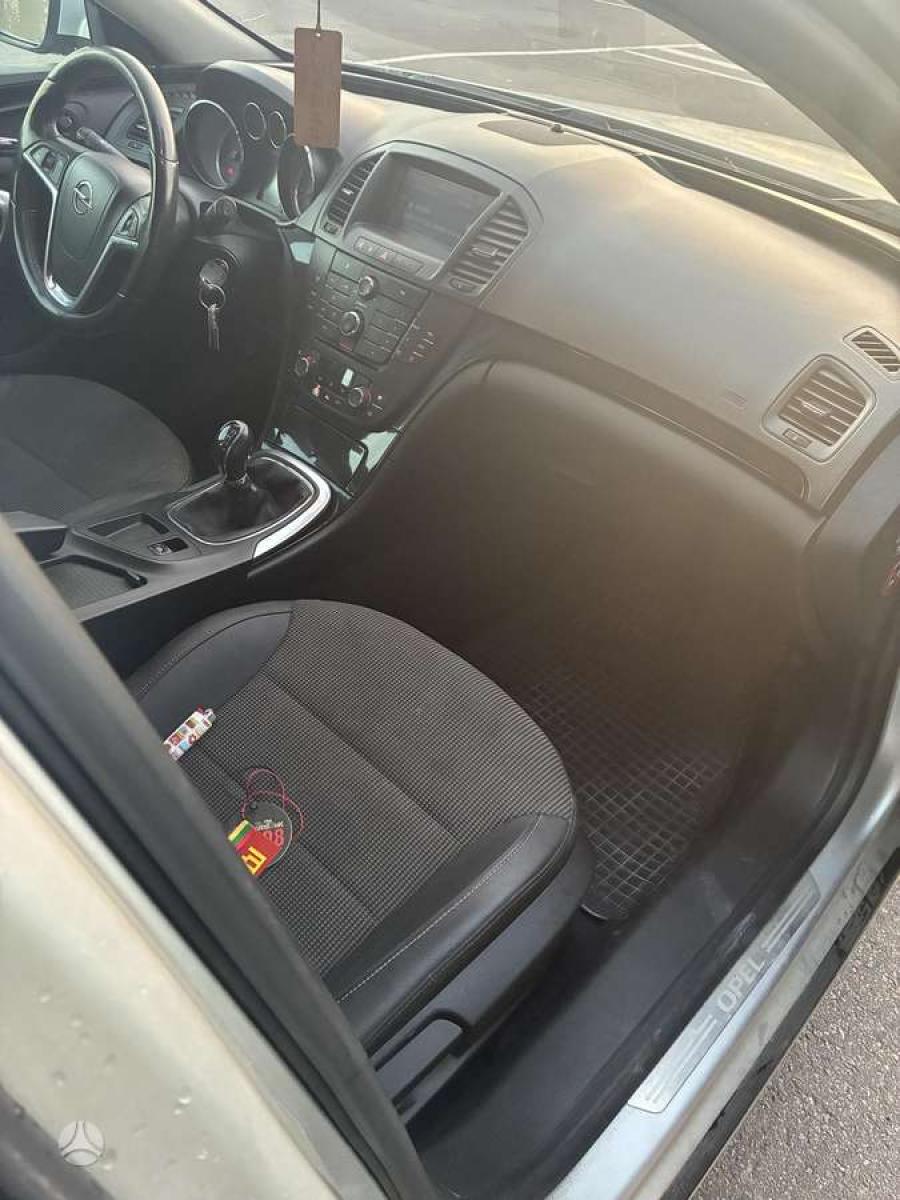 Grey Opel Insignia 2011 in Trakai, with an engine capacity of 1.96 L and mileage of 315 thousand km for 2400 €, photo 11 on AUTOMOTO.COM.LV