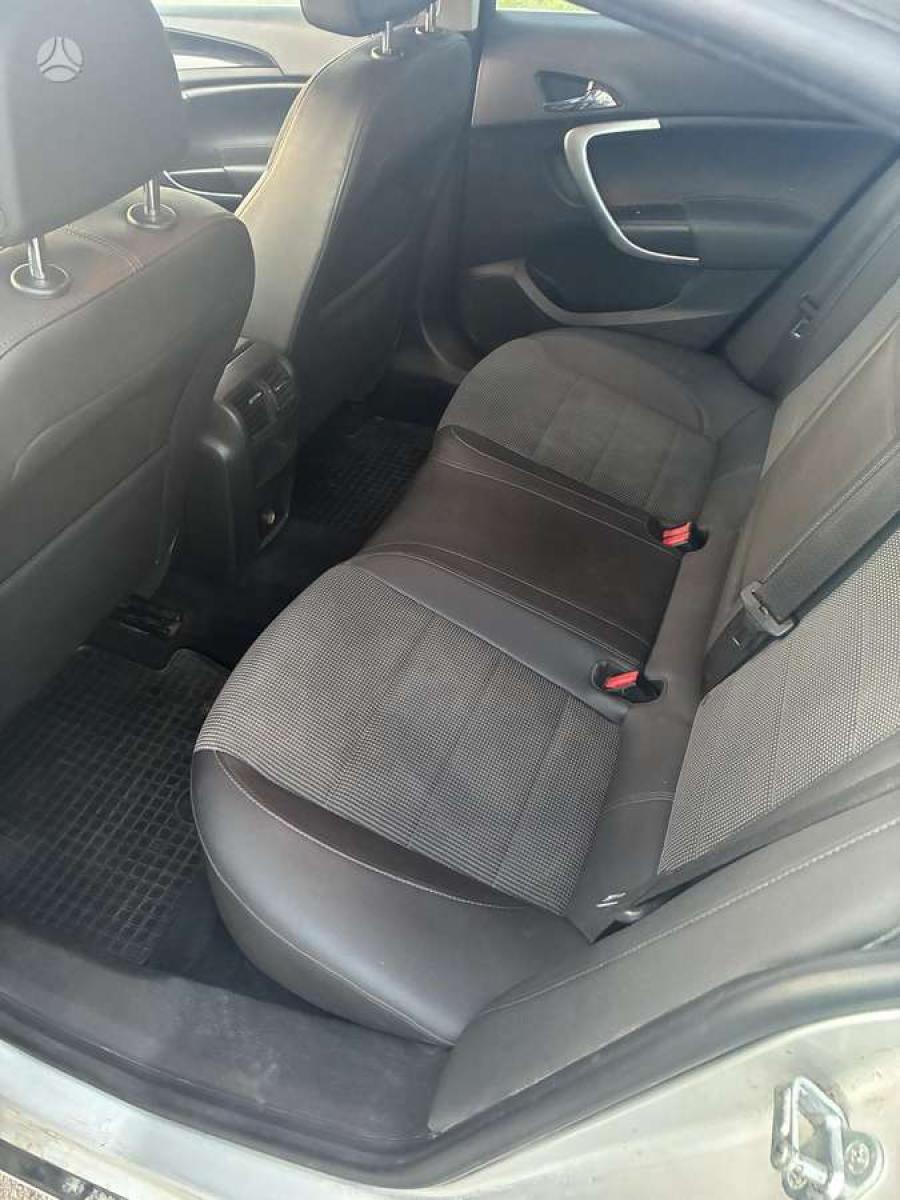 Grey Opel Insignia 2011 in Trakai, with an engine capacity of 1.96 L and mileage of 315 thousand km for 2400 €, photo 12 on AUTOMOTO.COM.LV
