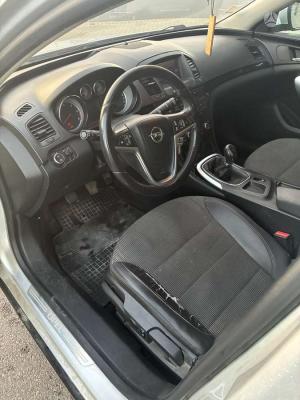 Grey Opel Insignia 2011 in Trakai, with an engine capacity of 1.96 L and mileage of 315 thousand km for 2400 €, photo 15 on AUTOMOTO.COM.LV