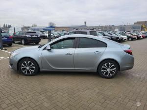Grey Opel Insignia 2015 in Taurage, with an engine capacity of 1.96 L and mileage of 296 thousand km for 5200 €, photo 7 on AUTOMOTO.COM.LV