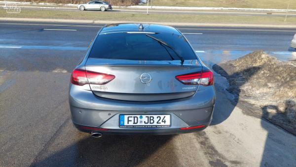 Grey Opel Insignia 2018 in Kaunas, with an engine capacity of 2.00 L and mileage of 283 thousand km for 9700 €, photo 9 on AUTOMOTO.COM.LV