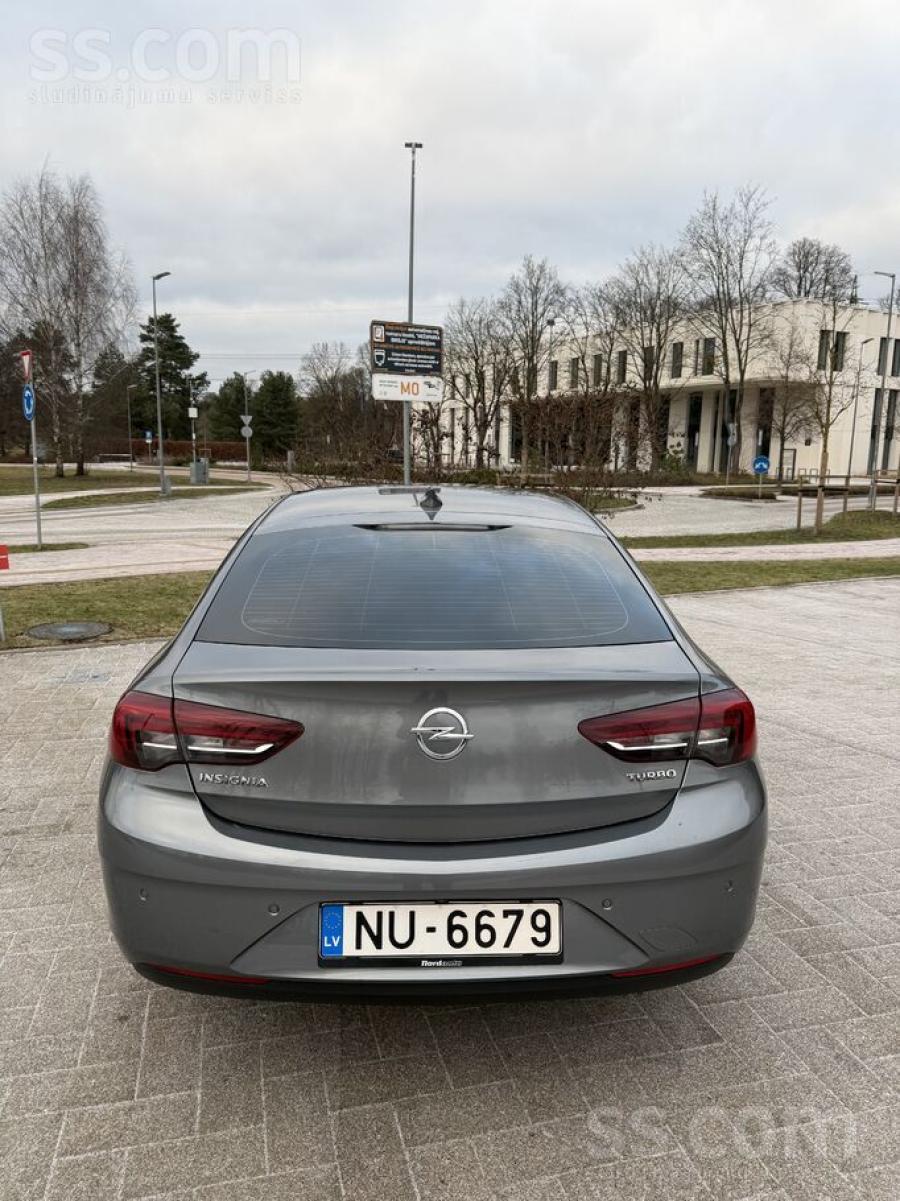 Grey Opel Insignia 2019 in Riga, with an engine capacity of 1.50 L and mileage of 140 thousand km for 11500 €, photo 2 on AUTOMOTO.COM.LV