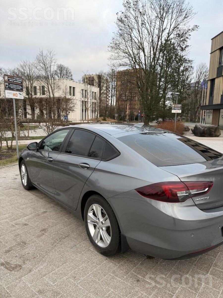 Grey Opel Insignia 2019 in Riga, with an engine capacity of 1.50 L and mileage of 140 thousand km for 11500 €, photo 3 on AUTOMOTO.COM.LV