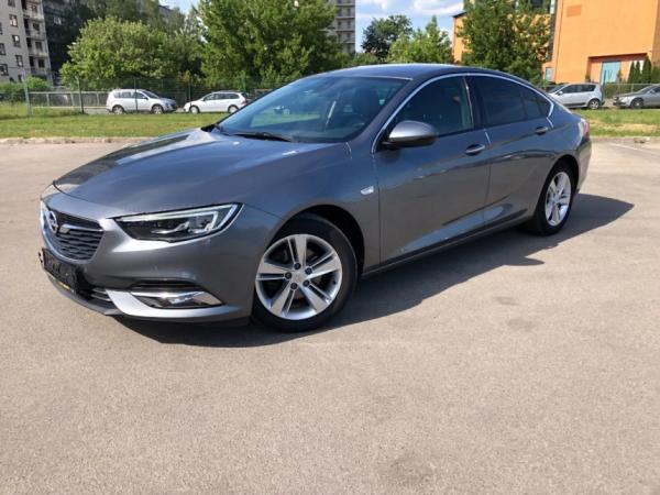 Grey Opel Insignia 2019 in Riga, with an engine capacity of 1.60 L and mileage of 156 thousand km for 12950 €, photo 1 on AUTOMOTO.COM.LV