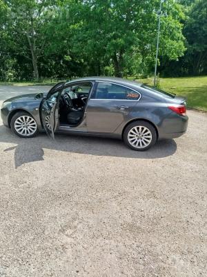 Grey Opel Insignia 2009 in Kuldiga, with an engine capacity of 2.00 L and mileage of 348 thousand km for 2550 €, photo 5 on AUTOMOTO.COM.LV