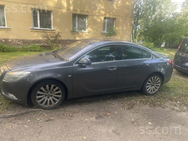 Pelēks Opel Insignia 2009 Rīga, ar dzinēja tilpumu 2.00 L un nobraukumu 298 tūkst. km par 2500 €, foto 3 vietnē AUTOMOTO.COM.LV