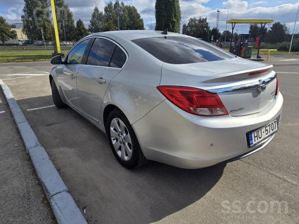 Pelēks Opel Insignia 2011 Rīga, ar dzinēja tilpumu 2.00 L un nobraukumu 256 tūkst. km par 2600 €, foto 5 vietnē AUTOMOTO.COM.LV