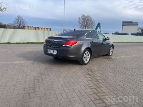 Pelēks Opel Insignia 2011 Liepāja, ar dzinēja tilpumu 2.00 L un nobraukumu 247 tūkst. km par 2800 €, foto 3 vietnē AUTOMOTO.COM.LV