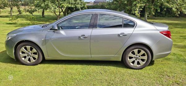 Grey Opel Insignia 2012 in Vilnius, with an engine capacity of 1.96 L and mileage of 230 thousand km for 4900 €, photo 3 on AUTOMOTO.COM.LV