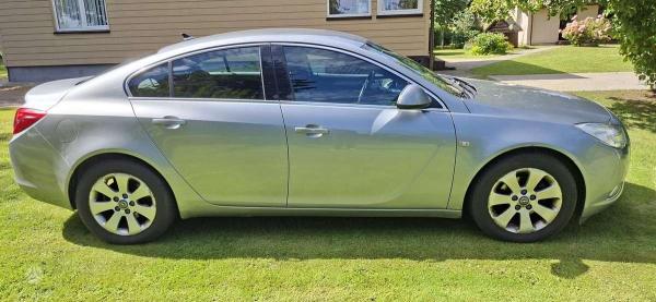 Grey Opel Insignia 2012 in Vilnius, with an engine capacity of 1.96 L and mileage of 230 thousand km for 4900 €, photo 4 on AUTOMOTO.COM.LV