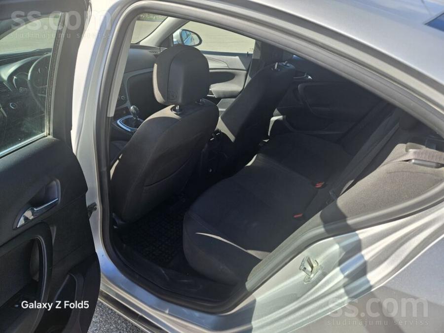 Pelēks Opel Insignia 2013 Jēkabpils, ar dzinēja tilpumu 1.90 L un nobraukumu 429 tūkst. km par 3300 €, foto 7 vietnē AUTOMOTO.COM.LV