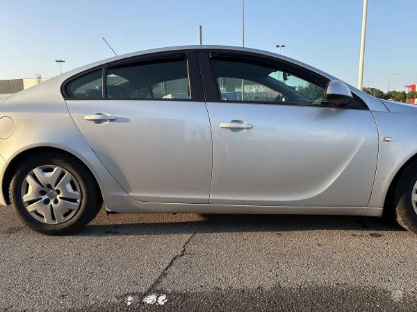 Grey Opel Insignia 2013 in Panevezys, with an engine capacity of 1.80 L and mileage of 219 thousand km for 1700 €, photo 4 on AUTOMOTO.COM.LV
