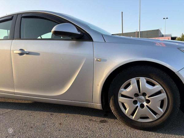Grey Opel Insignia 2013 in Panevezys, with an engine capacity of 1.80 L and mileage of 219 thousand km for 1700 €, photo 6 on AUTOMOTO.COM.LV