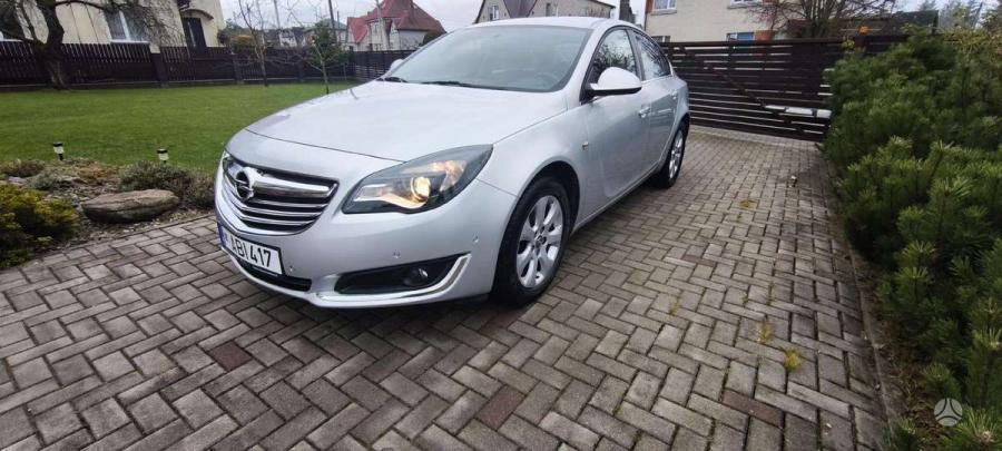 Grey Opel Insignia 2014 in Kaunas, with an engine capacity of 1.96 L and mileage of 244 thousand km for 3450 €, photo 1 on AUTOMOTO.COM.LV