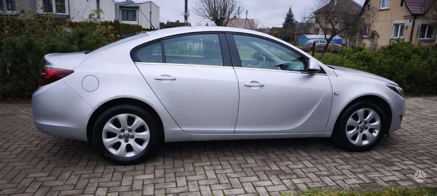 Grey Opel Insignia 2014 in Kaunas, with an engine capacity of 1.96 L and mileage of 244 thousand km for 3450 €, photo 7 on AUTOMOTO.COM.LV