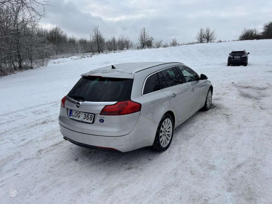 Grey Opel Insignia 2009 in Kaunas, with an engine capacity of 2.00 L and mileage of 350 thousand km for 2999 €, photo 3 on AUTOMOTO.COM.LV