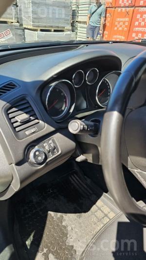 Pelēks Opel Insignia 2009 Daugavpils, ar dzinēja tilpumu 1.80 L un nobraukumu 176 tūkst. km par 4200 €, foto 6 vietnē AUTOMOTO.COM.LV