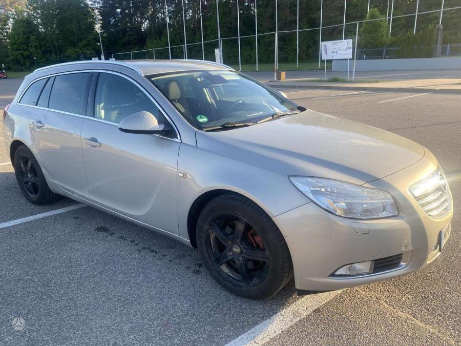 Grey Opel Insignia 2009 in Vilnius, with an engine capacity of 1.96 L and mileage of 332 thousand km for 2550 €, photo 3 on AUTOMOTO.COM.LV