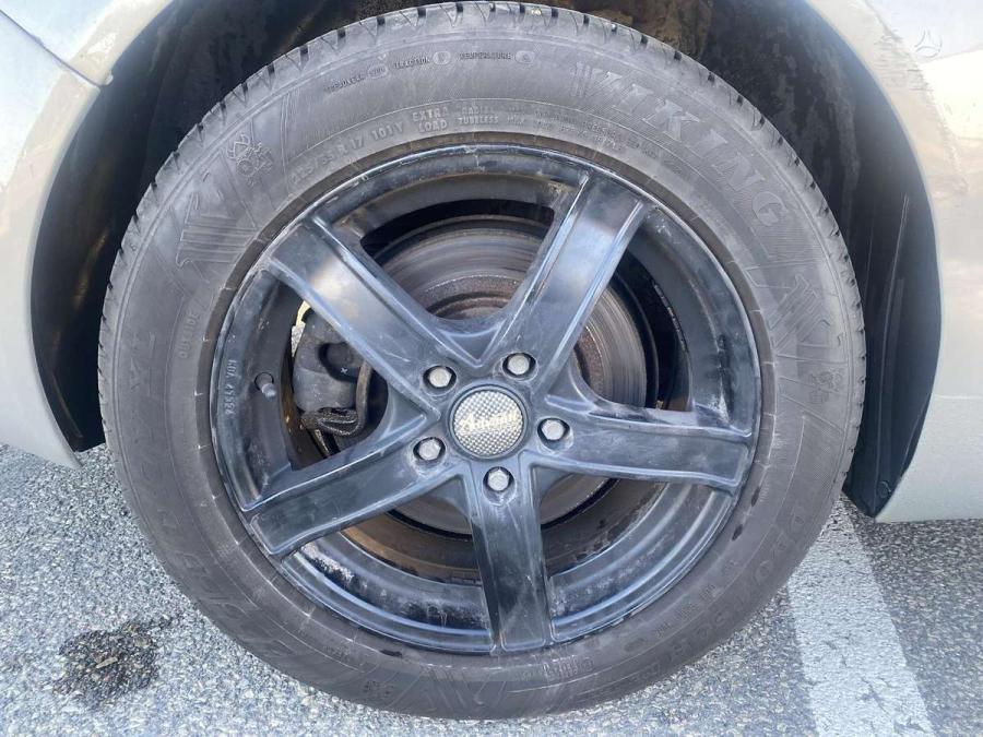 Grey Opel Insignia 2009 in Vilnius, with an engine capacity of 1.96 L and mileage of 332 thousand km for 2550 €, photo 9 on AUTOMOTO.COM.LV