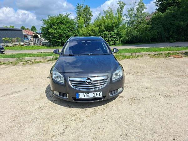 Grey Opel Insignia 2009 in Panevezys, with an engine capacity of 1.96 L and mileage of 336 thousand km for 2300 €, photo 1 on AUTOMOTO.COM.LV