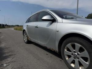 Grey Opel Insignia 2009 in Kaunas, with an engine capacity of 2.00 L and mileage of 286 thousand km for 1700 €, photo 6 on AUTOMOTO.COM.LV