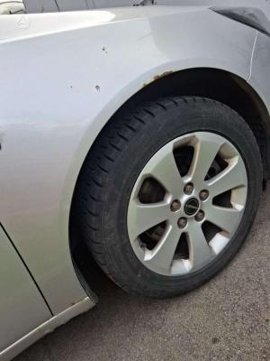 Grey Opel Insignia 2009 in Siauliai, with an engine capacity of 1.96 L and mileage of 314 thousand km for 1750 €, photo 5 on AUTOMOTO.COM.LV