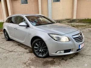 Grey Opel Insignia 2010 in Siauliai, with an engine capacity of 1.96 L and mileage of 280 thousand km for 3199 €, photo  on AUTOMOTO.COM.LV