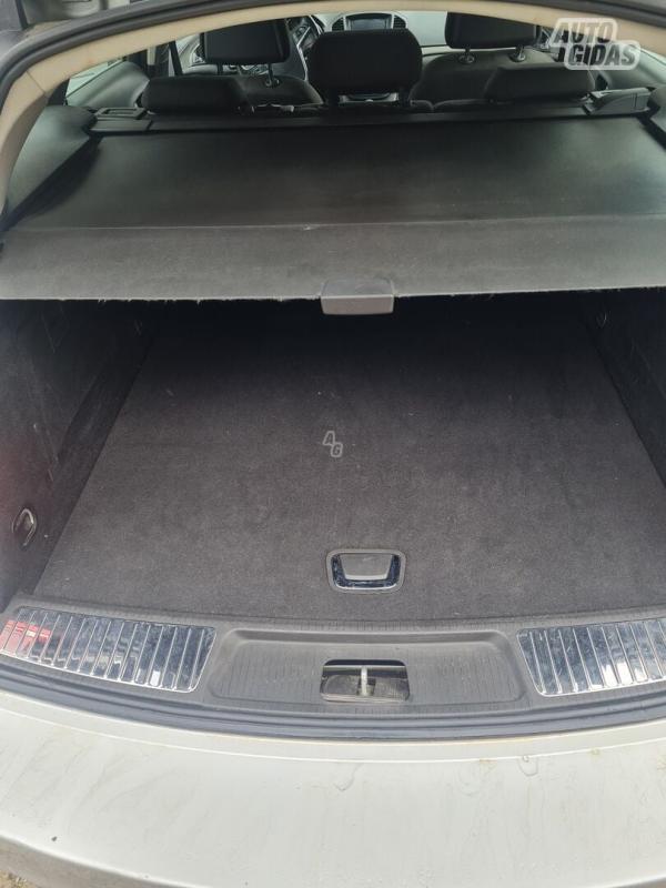 Grey Opel Insignia 2010 in Panevezys, with an engine capacity of 2.00 L and mileage of 254 thousand km for 1450 €, photo 8 on AUTOMOTO.COM.LV