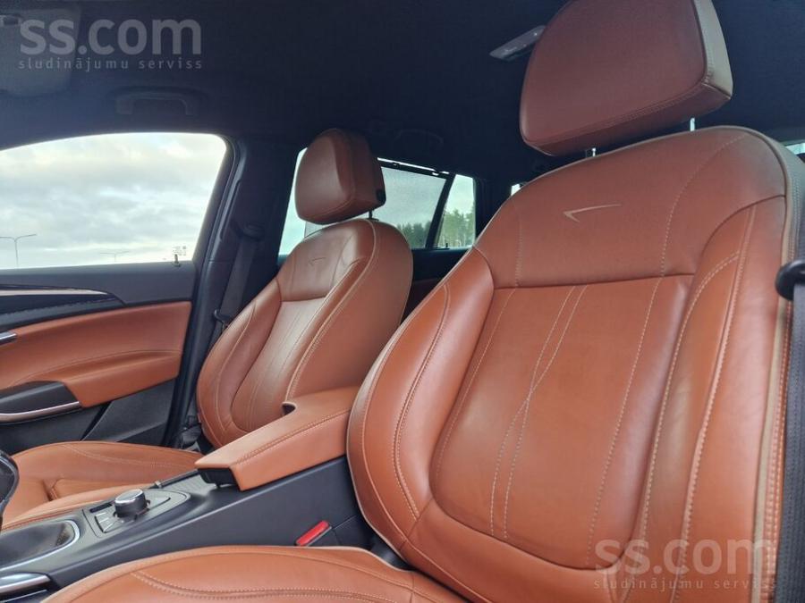 Grey Opel Insignia 2011 in Riga, with an engine capacity of 2.00 L and mileage of 224 thousand km for 4450 €, photo 11 on AUTOMOTO.COM.LV