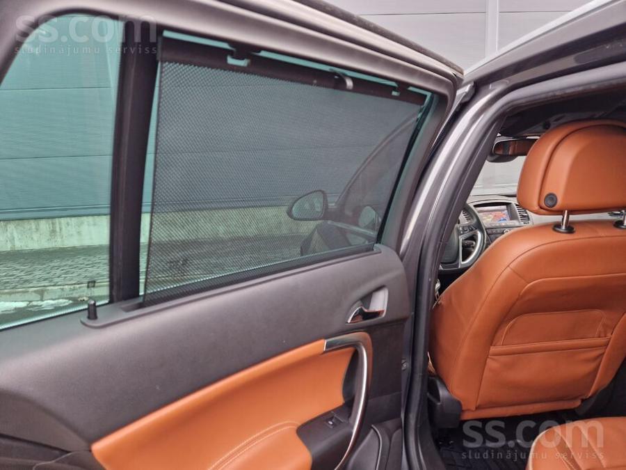 Grey Opel Insignia 2011 in Riga, with an engine capacity of 2.00 L and mileage of 224 thousand km for 4450 €, photo 13 on AUTOMOTO.COM.LV