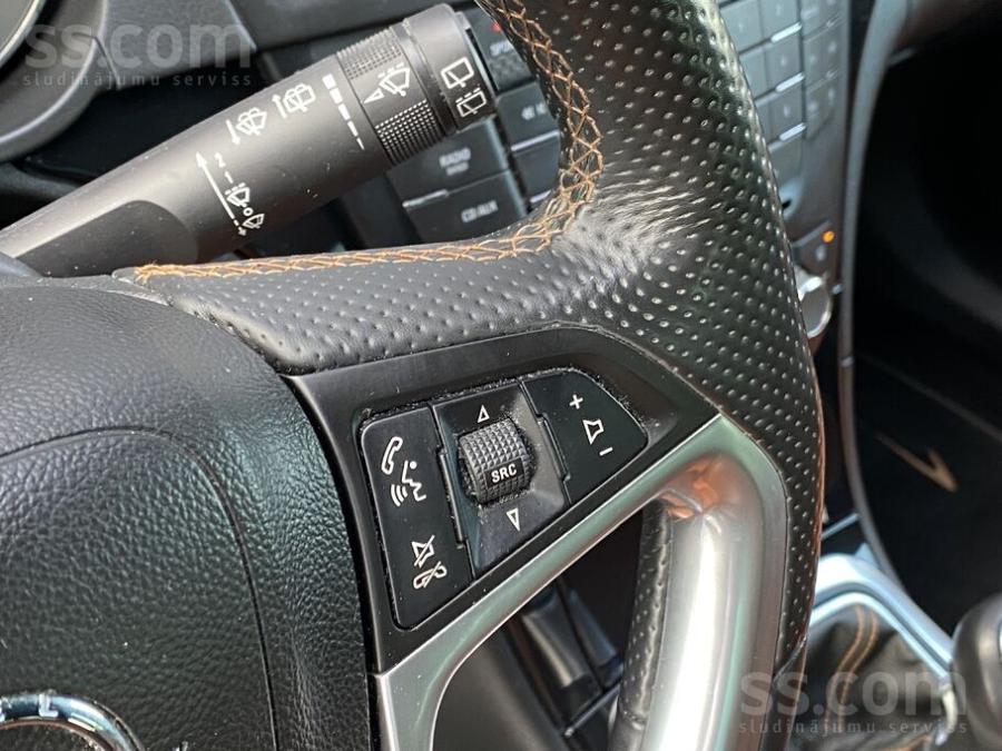 Grey Opel Insignia 2011 in Riga, with an engine capacity of 2.00 L and mileage of 224 thousand km for 4450 €, photo 19 on AUTOMOTO.COM.LV