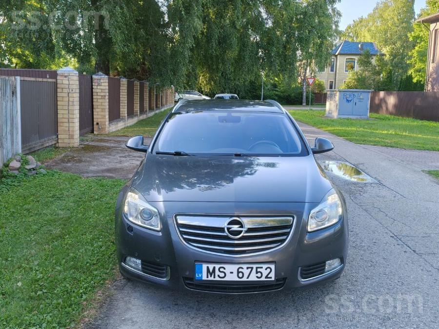 Grey Opel Insignia 2011 in Riga, with an engine capacity of 2.00 L and mileage of 335 thousand km for 2199 €, photo 6 on AUTOMOTO.COM.LV