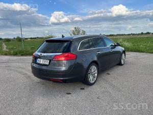 Grey Opel Insignia 2012 in Riga, with an engine capacity of 2.00 L and mileage of 401 thousand km for 3750 €, photo 6 on AUTOMOTO.COM.LV