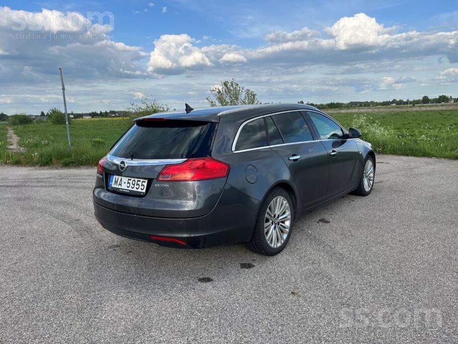 Grey Opel Insignia 2012 in Riga, with an engine capacity of 2.00 L and mileage of 401 thousand km for 3750 €, photo 6 on AUTOMOTO.COM.LV