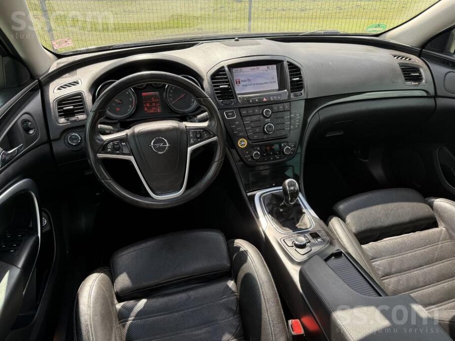 Grey Opel Insignia 2012 in Riga, with an engine capacity of 2.00 L and mileage of 214 thousand km for 2750 €, photo 9 on AUTOMOTO.COM.LV