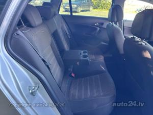 Grey Opel Insignia 2012 in Tallinn, with an engine capacity of 2.00 L and mileage of 294 thousand km for 2299 €, photo 8 on AUTOMOTO.COM.LV