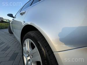 Grey Opel Insignia 2013 in Riga, with an engine capacity of 2.00 L and mileage of 237 thousand km for 4250 €, photo 6 on AUTOMOTO.COM.LV