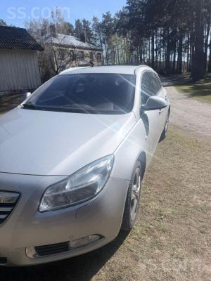 Grey Opel Insignia 2013 in Riga, with an engine capacity of 2.00 L and mileage of 212 thousand km for 6250 €, photo 8 on AUTOMOTO.COM.LV