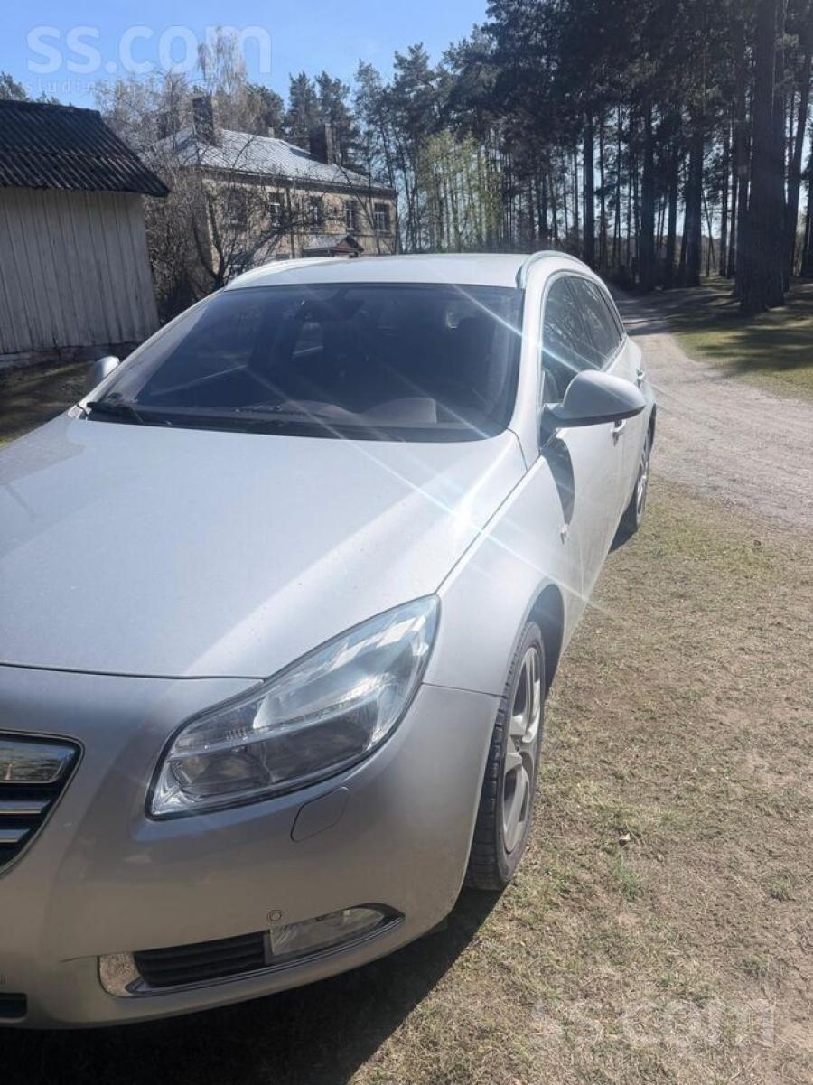 Grey Opel Insignia 2013 in Riga, with an engine capacity of 2.00 L and mileage of 212 thousand km for 6250 €, photo 8 on AUTOMOTO.COM.LV