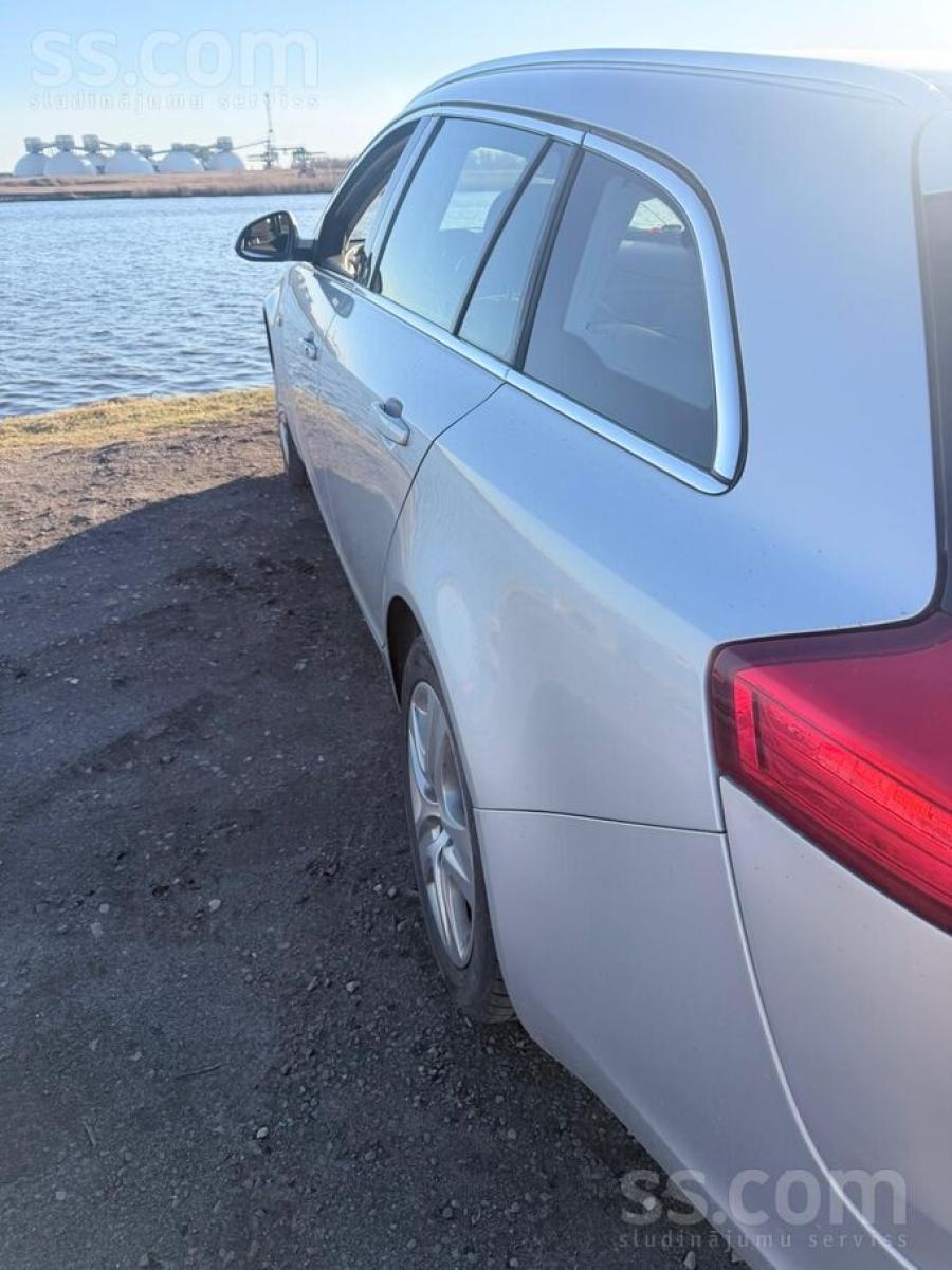 Grey Opel Insignia 2013 in Riga, with an engine capacity of 2.00 L and mileage of 212 thousand km for 6250 €, photo 19 on AUTOMOTO.COM.LV