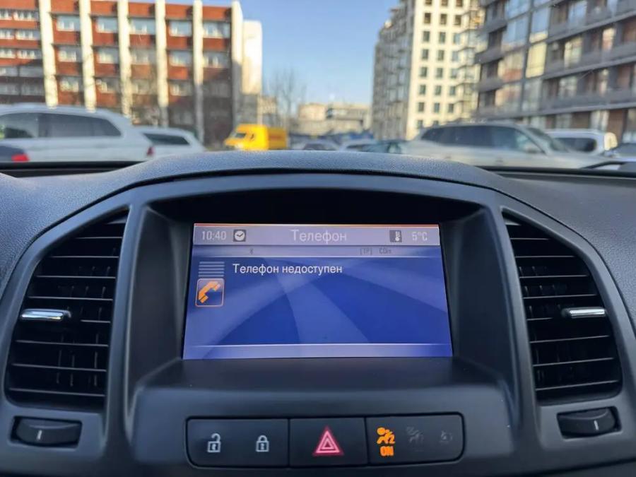 Grey Opel Insignia 2013 in Riga, with an engine capacity of 2.00 L and mileage of 356 thousand km for 2490 €, photo 11 on AUTOMOTO.COM.LV