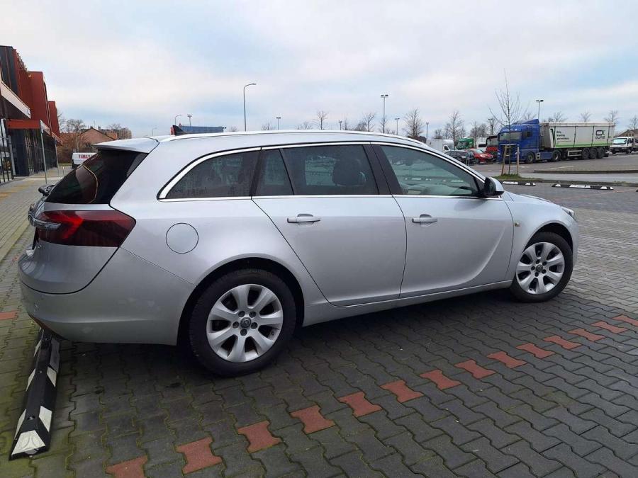 Grey Opel Insignia 2015 in Klaipeda, with an engine capacity of 2.00 L and mileage of 235 thousand km for 5100 €, photo 6 on AUTOMOTO.COM.LV