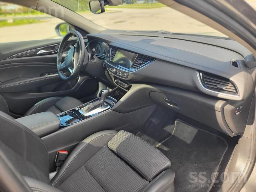 Grey Opel Insignia 2018 in Ogre, with an engine capacity of 2.00 L and mileage of 220 thousand km for 10250 €, photo 6 on AUTOMOTO.COM.LV