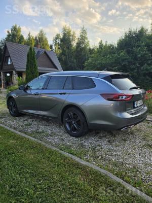Grey Opel Insignia 2021 in Riga, with an engine capacity of 2.00 L and mileage of 159 thousand km for 13650 €, photo 6 on AUTOMOTO.COM.LV