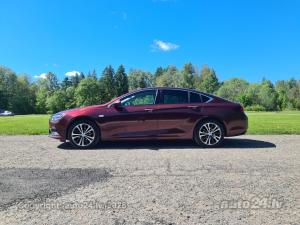 Red Opel Insignia 2018 in Tallinn, with an engine capacity of 1.50 L and mileage of 202 thousand km for 11990 €, photo 3 on AUTOMOTO.COM.LV
