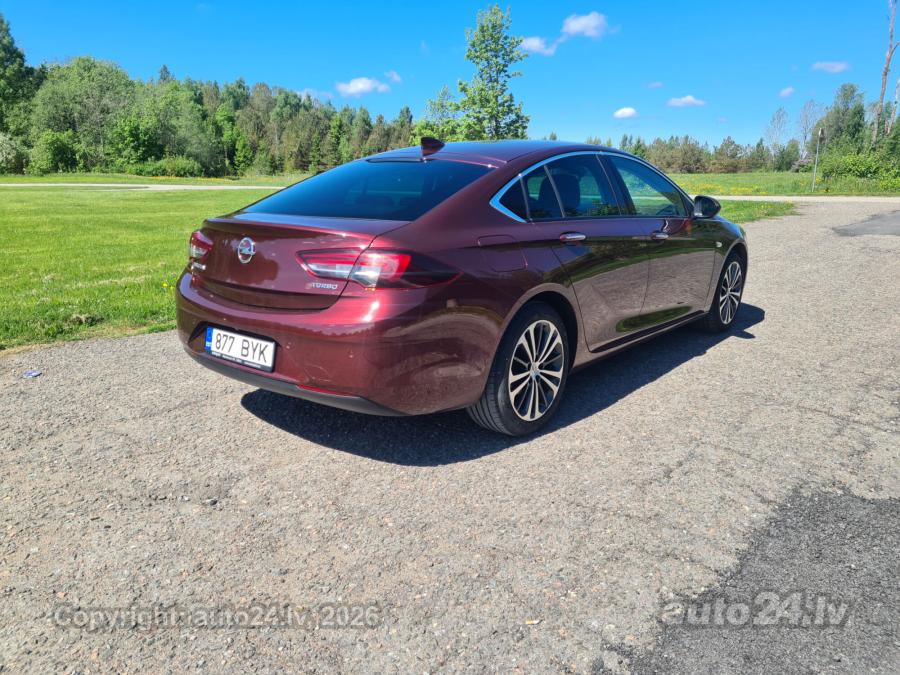 Red Opel Insignia 2018 in Tallinn, with an engine capacity of 1.50 L and mileage of 202 thousand km for 11990 €, photo 6 on AUTOMOTO.COM.LV